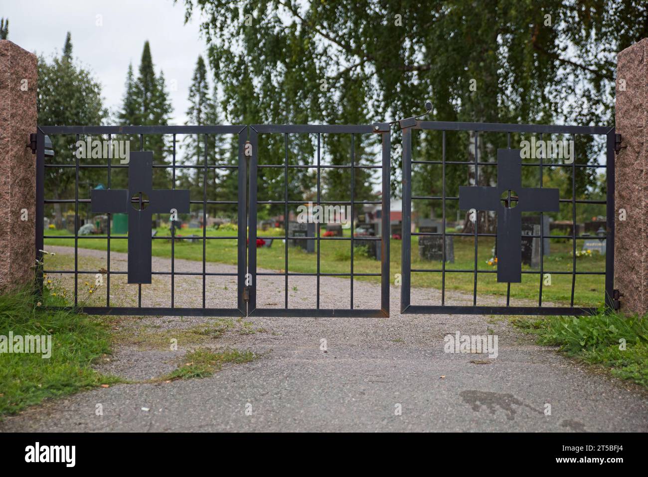 Entrance to cemetery with old wrought iron gate with crosses Stock ...