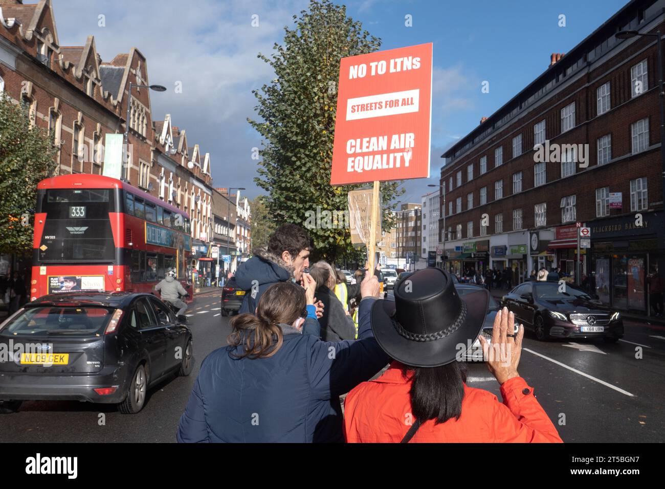 London, UK. 4 November 2023. Local residents rally with placards on ...