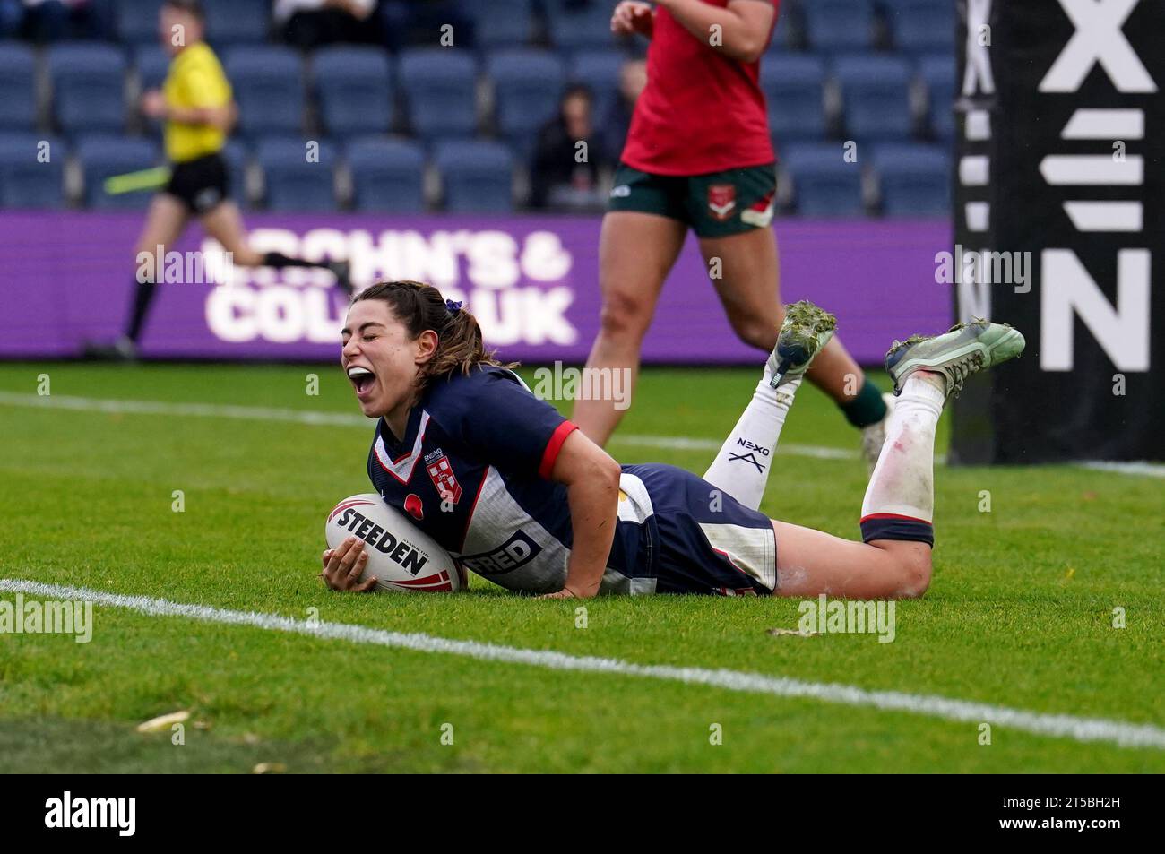 England's Emily Rudge scores a try during the women's international ...