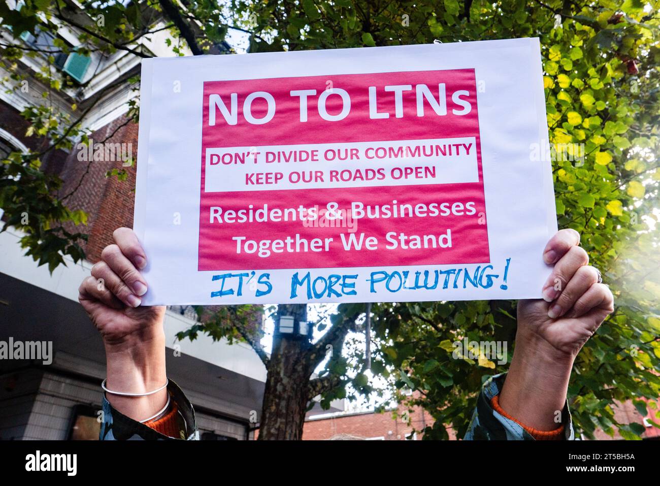 London, UK. 4 November 2023. Local residents rally with placards on ...