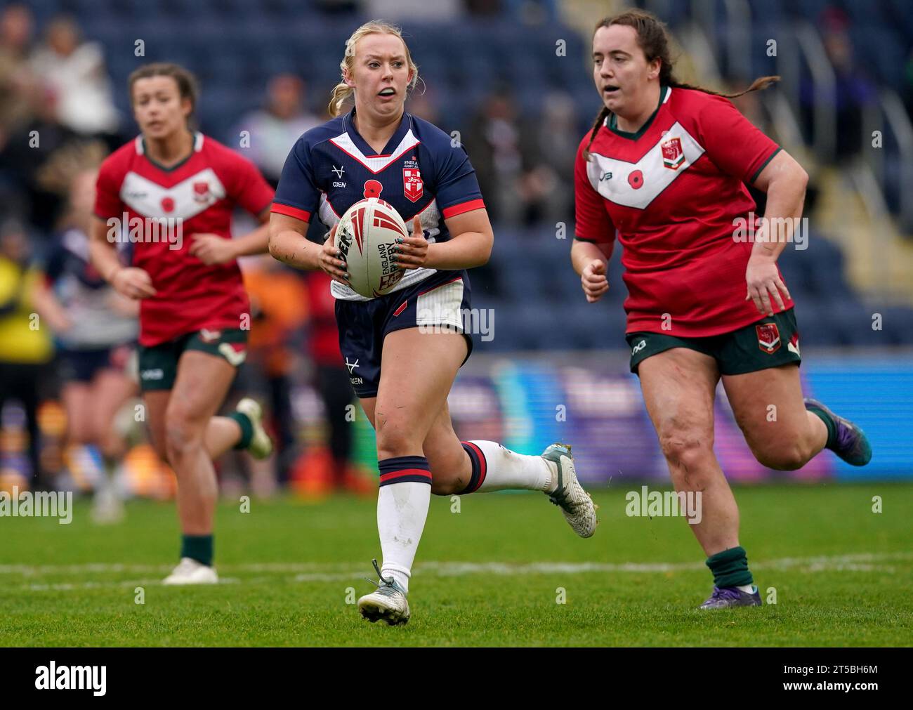 England's Keara Bennett breaks away to score a try during the women's ...