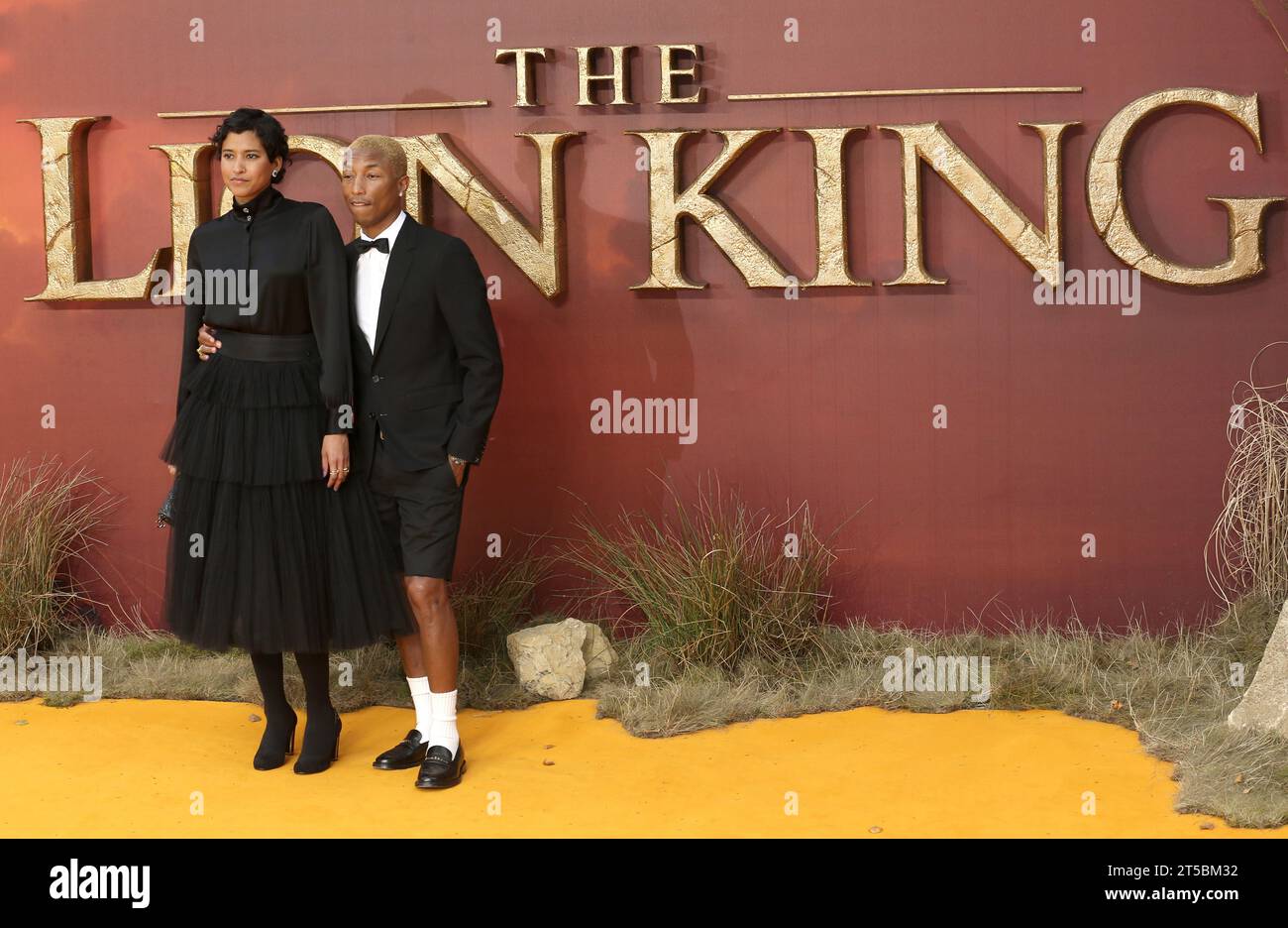 Helen Lasichanh and Pharrell Williams attend "The Lion King" European ...