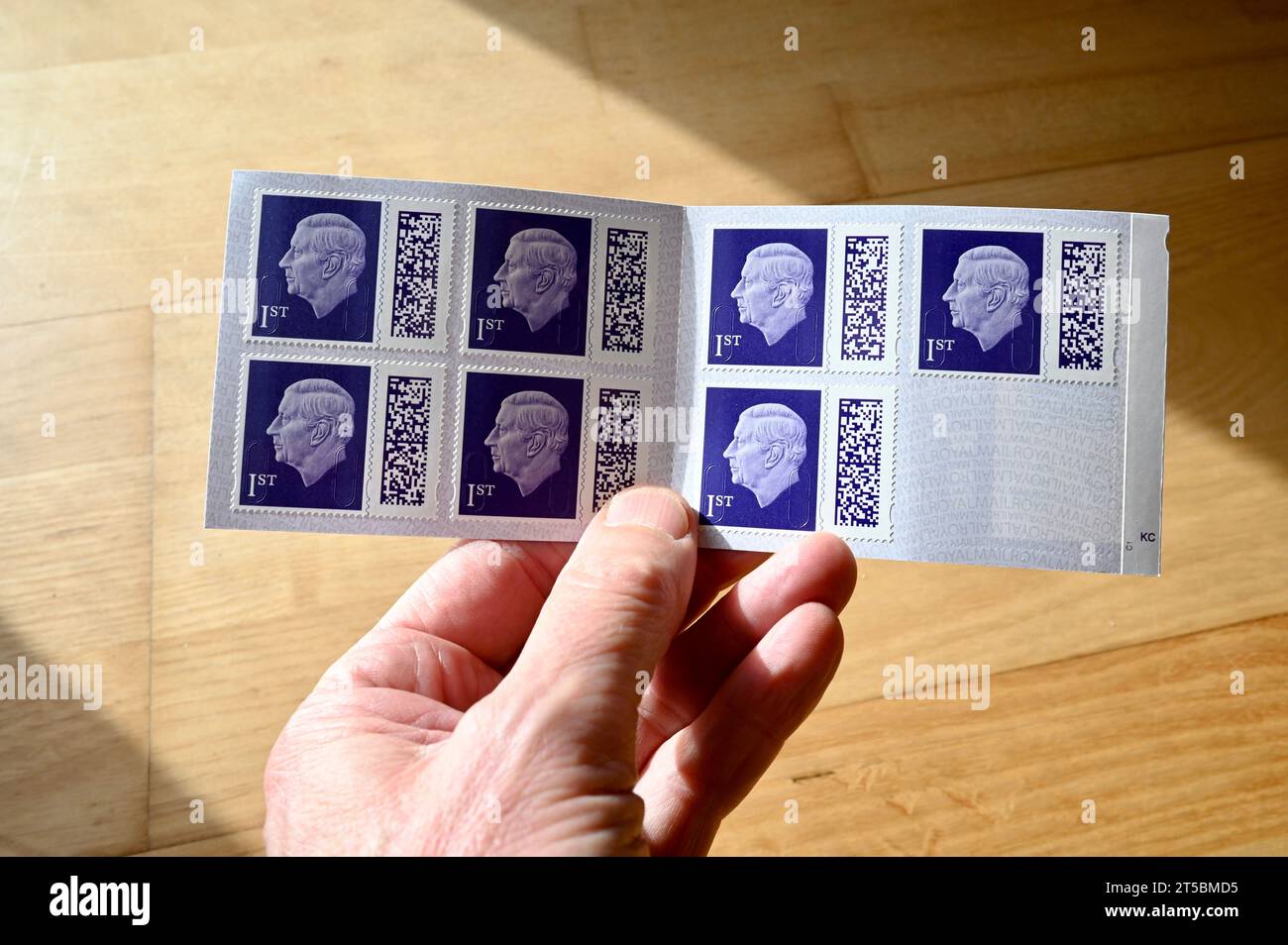 Book of first class Stamps, UK Stock Photo - Alamy