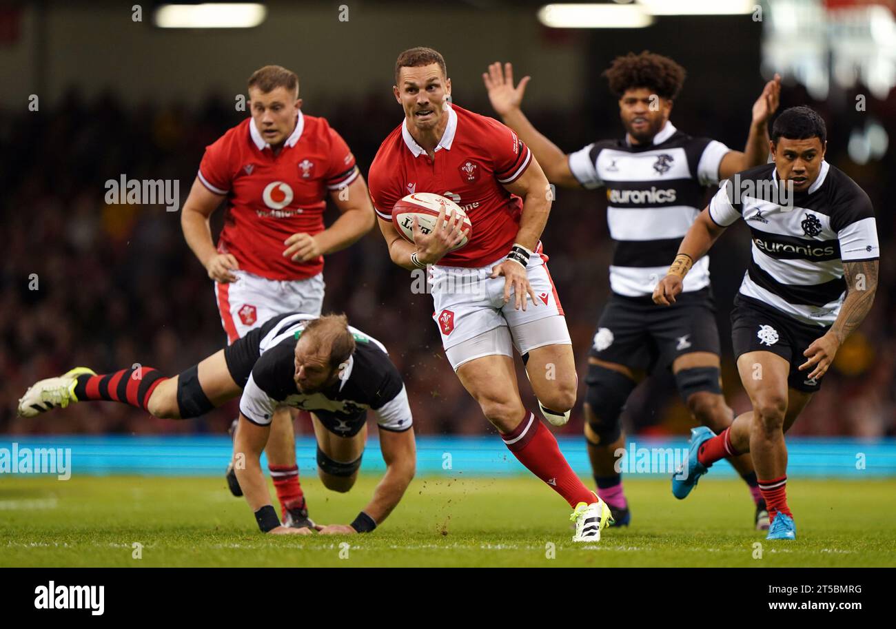 Wales' George North evades a tackle from Barbarians' Alun Wyn Jones ...