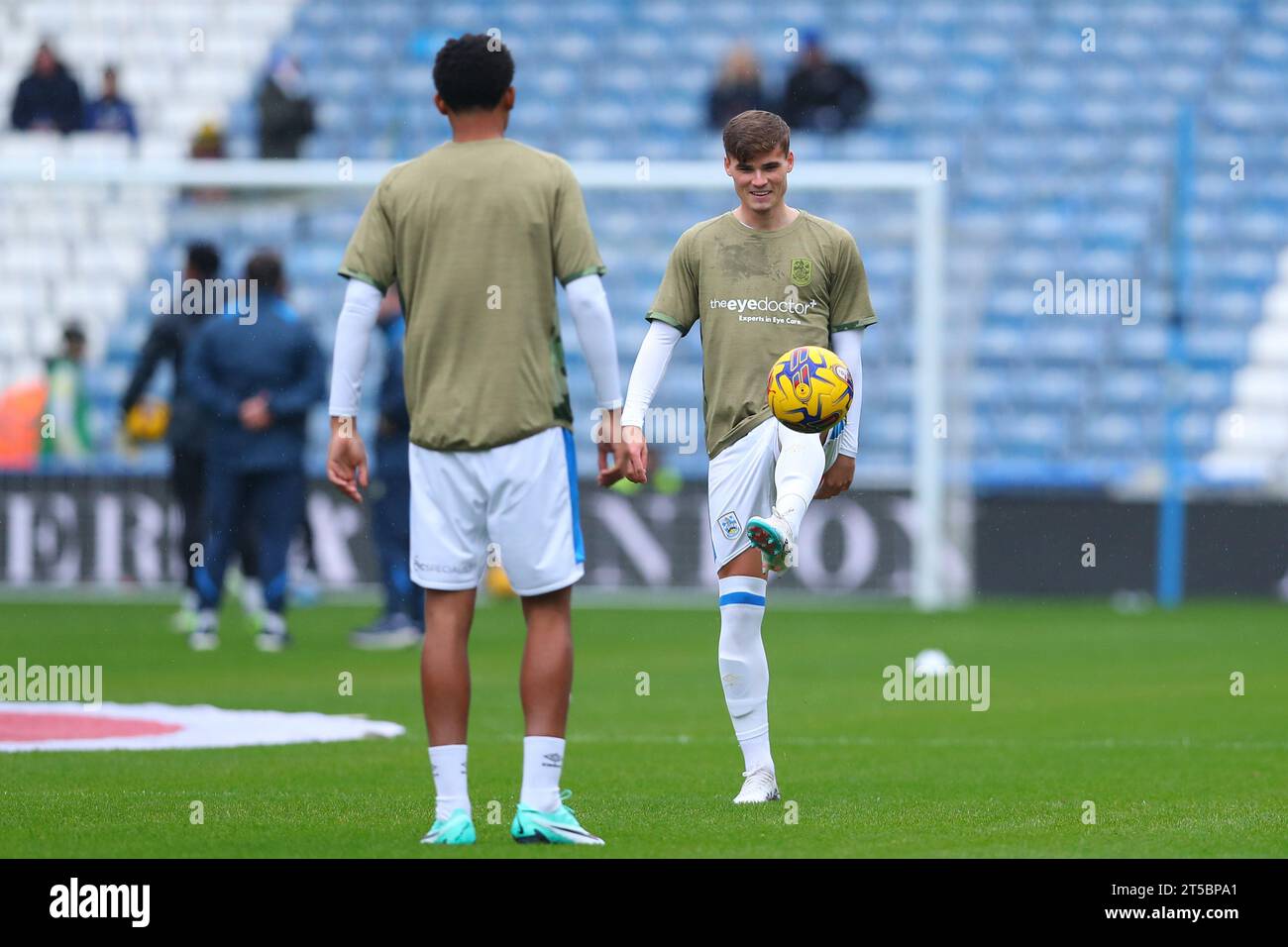 Huddersfield, UK. 04th Nov, 2023. Luke Daley of Huddersfield Town warms ...