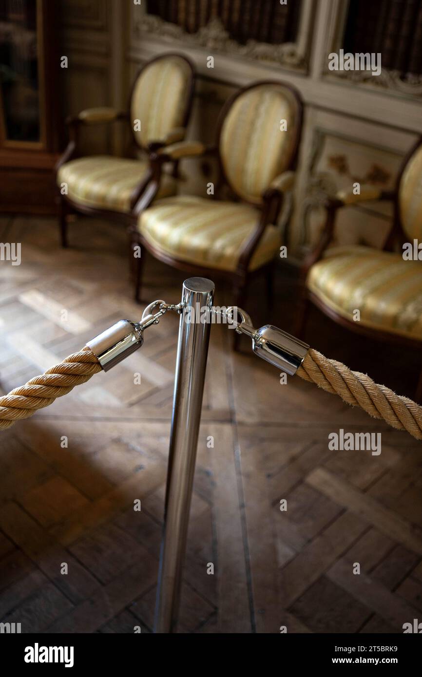 Security cord in a Museum in Paris Stock Photo - Alamy