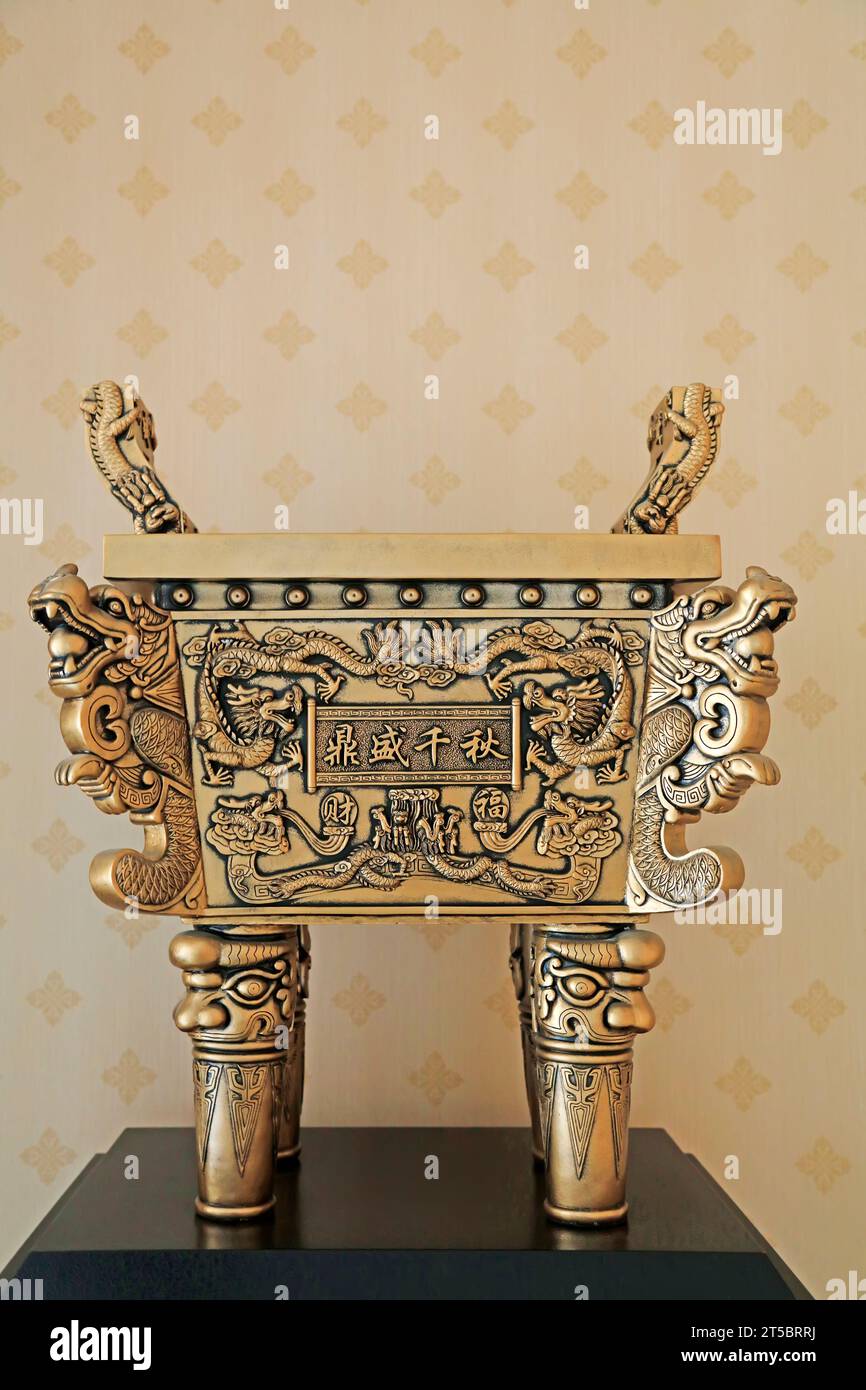 Chinese traditional style bronze tripods Stock Photo - Alamy