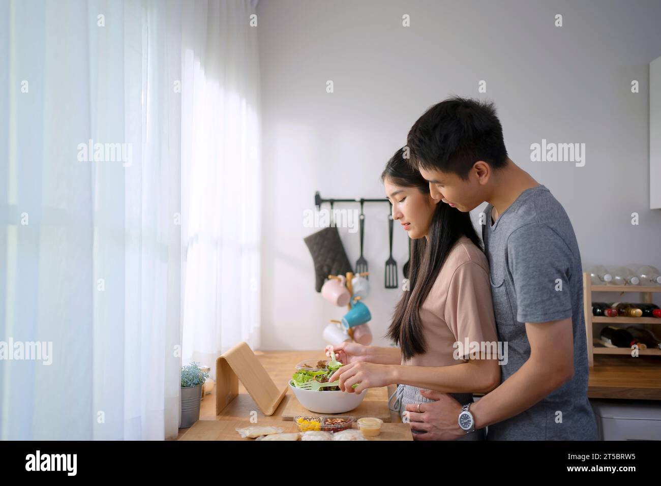 Couple prepare food at kitchen. Healthy food and leisure activity concept Stock Photo - Alamy