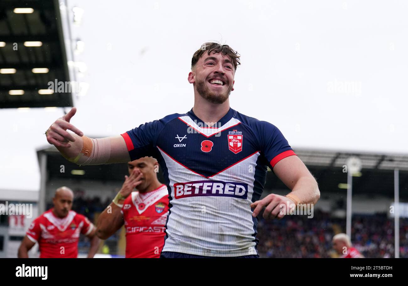 England's Matty Ashton celebrates after scoring his sides second try of ...