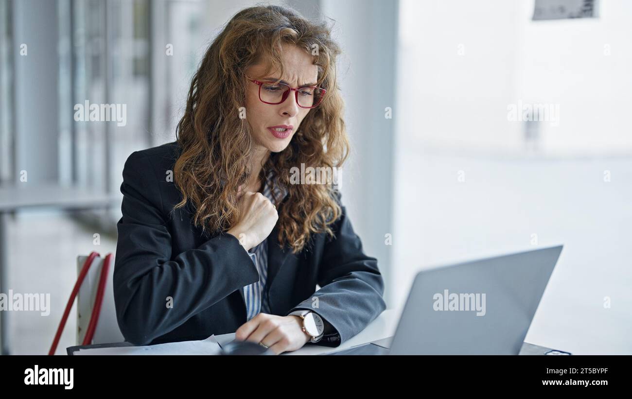 Sick woman coughing using laptop hi-res stock photography and images ...