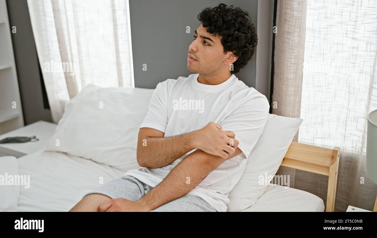 Man scratching arm hi-res stock photography and images - Alamy