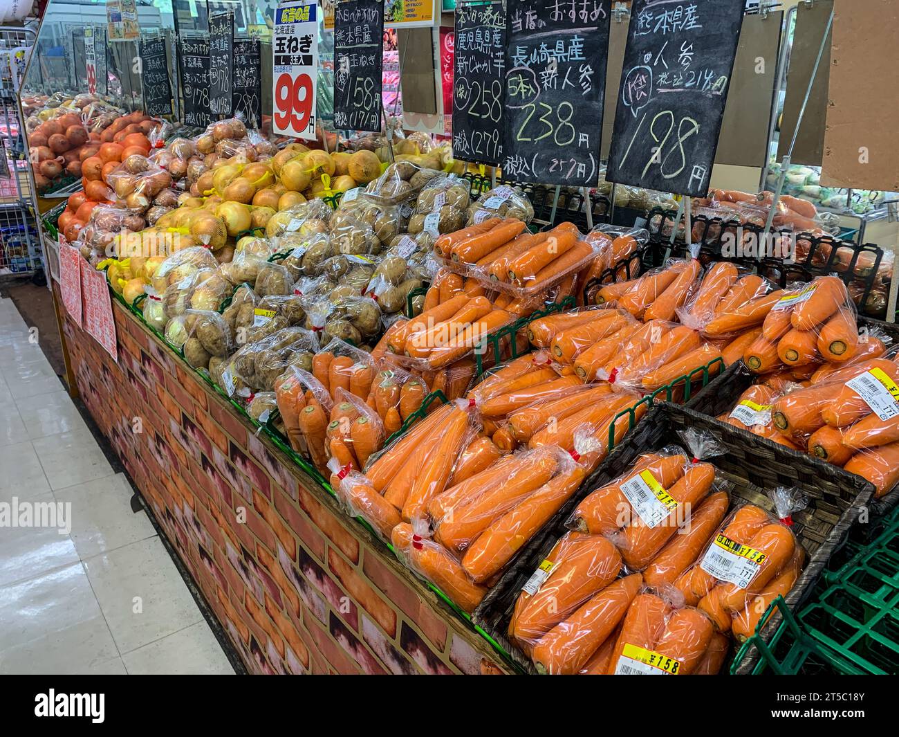 Japan, Kyushu, Imi. Small Grocery Store, Vegetables Wrapped in Plastic ...