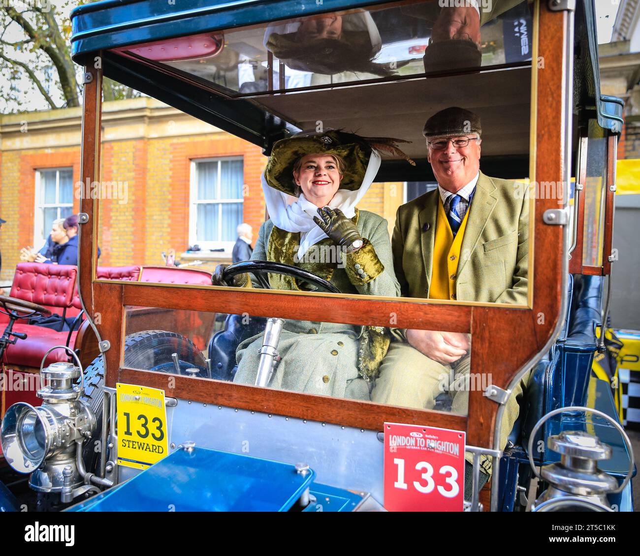 London, UK. 04th Nov, 2023. The proud owners sit in their 1902 12hp ...