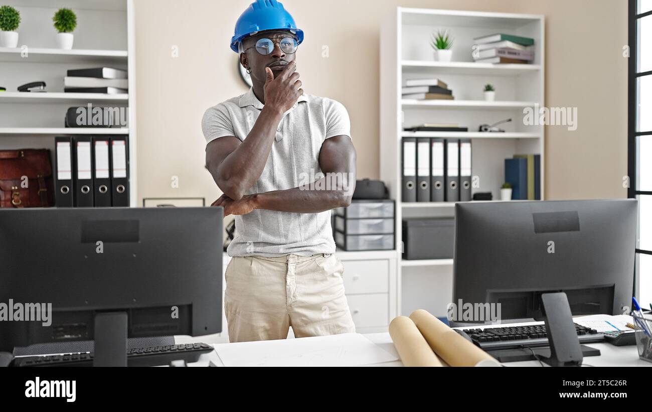 African american man architect standing thinking at the office Stock ...