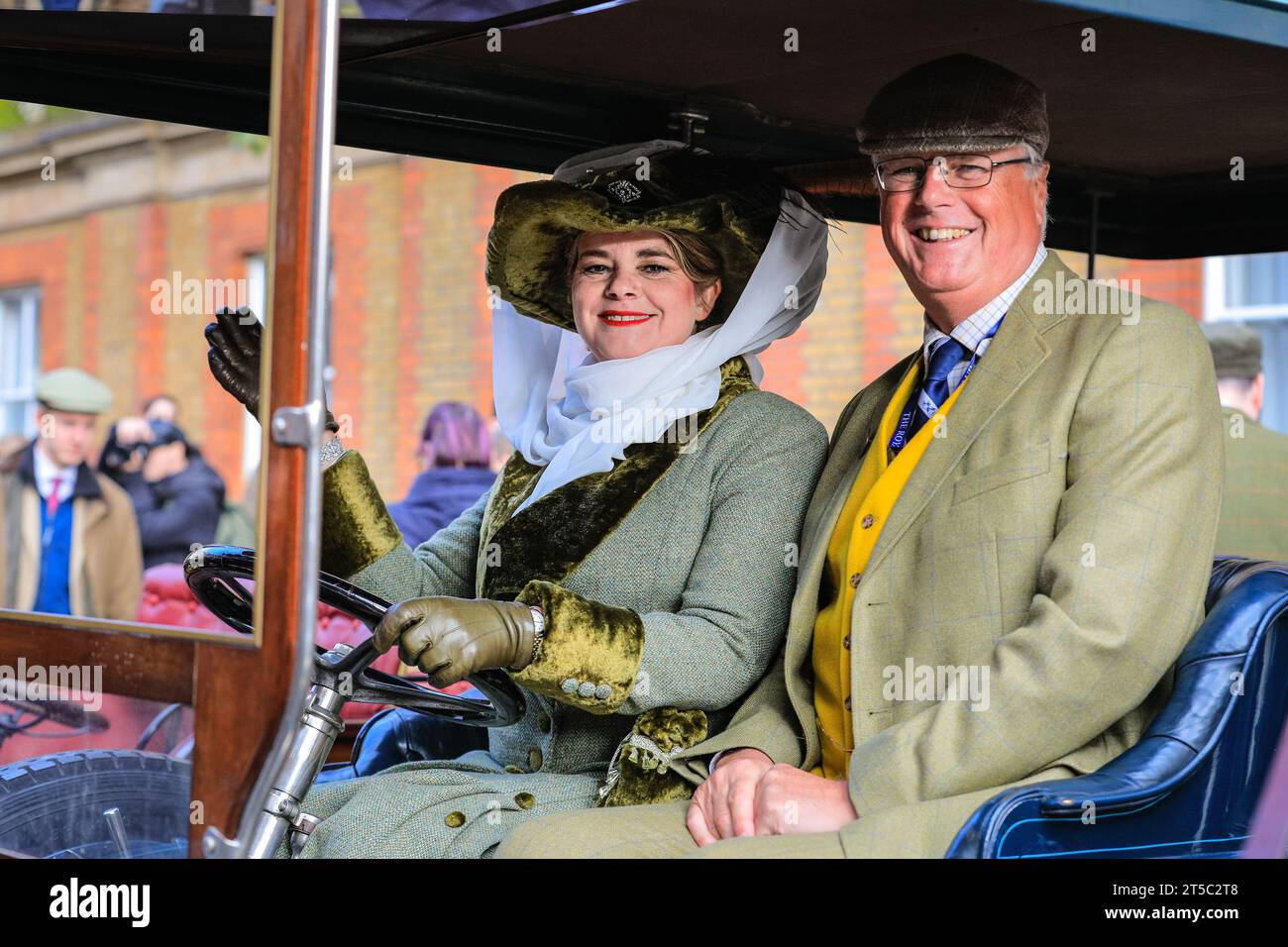 London, UK. 04th Nov, 2023. The proud owners sit in their 1902 12hp ...