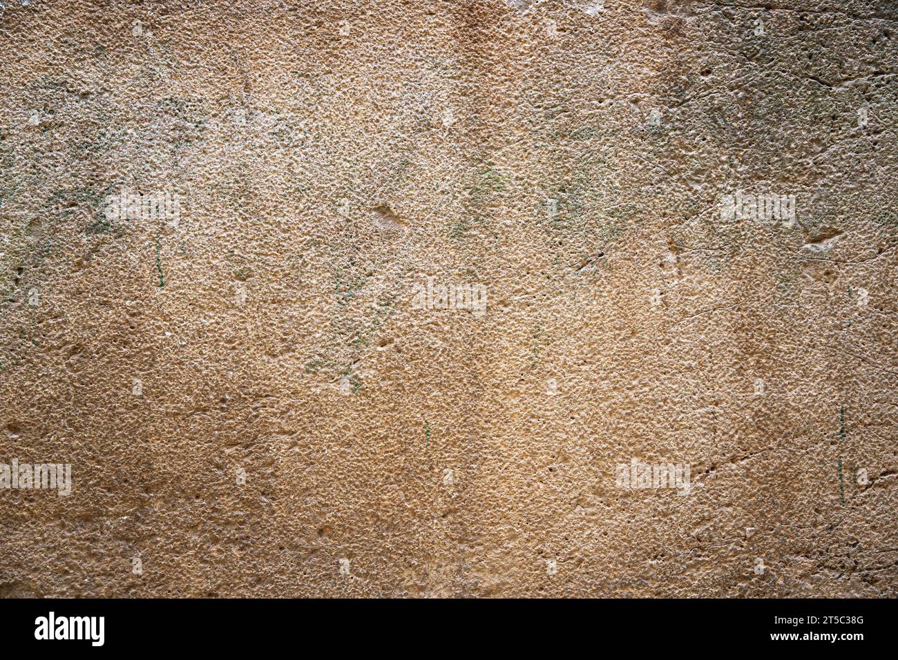Texture of an ancient stone slab on the wall of the Cave of the ...
