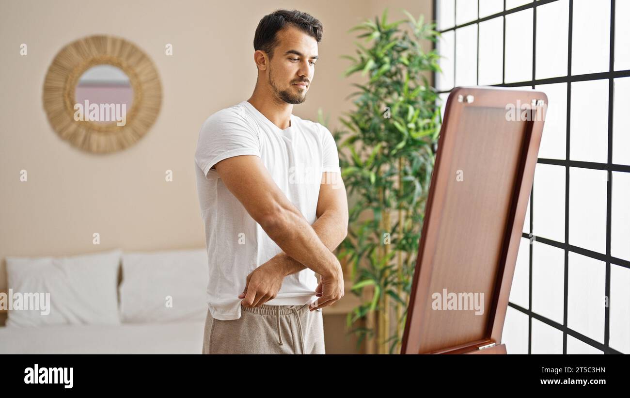 Man taking his shirt off hi-res stock photography and images - Alamy