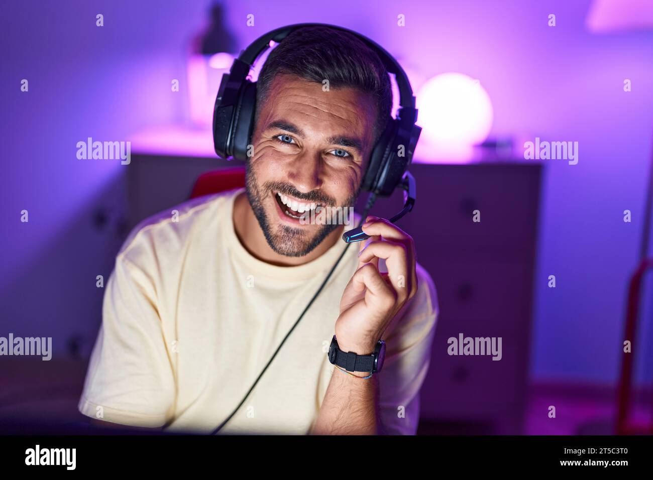 Young hispanic man streamer smiling confident having video call at ...