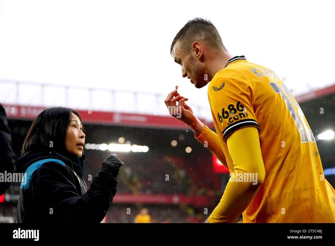 Wolverhampton Wanderers' Sasa Kalajdzic speaks to first team doctor Kai Win after picking up an ...