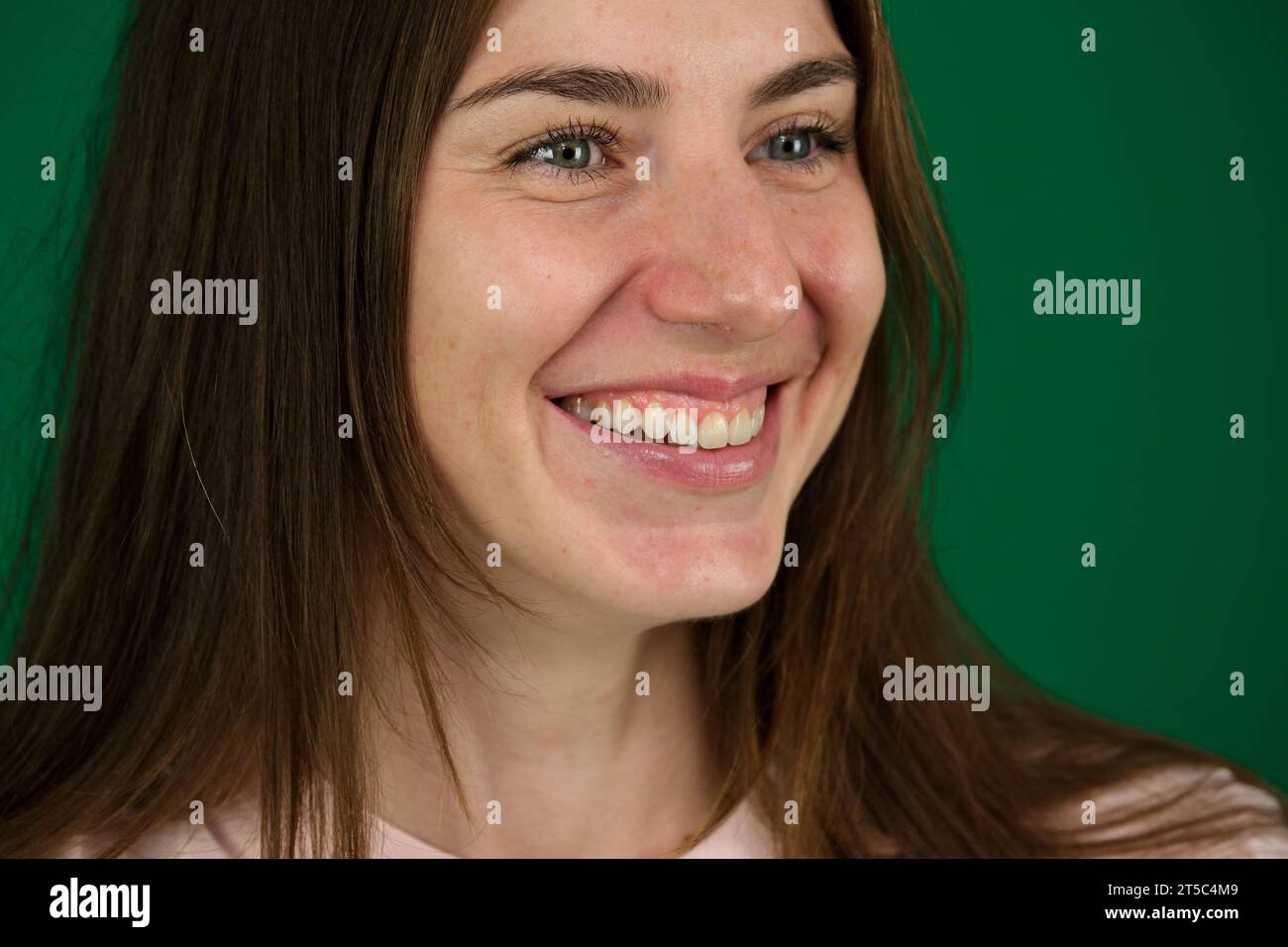 different emotions of a young girl on a green background chromakey ...