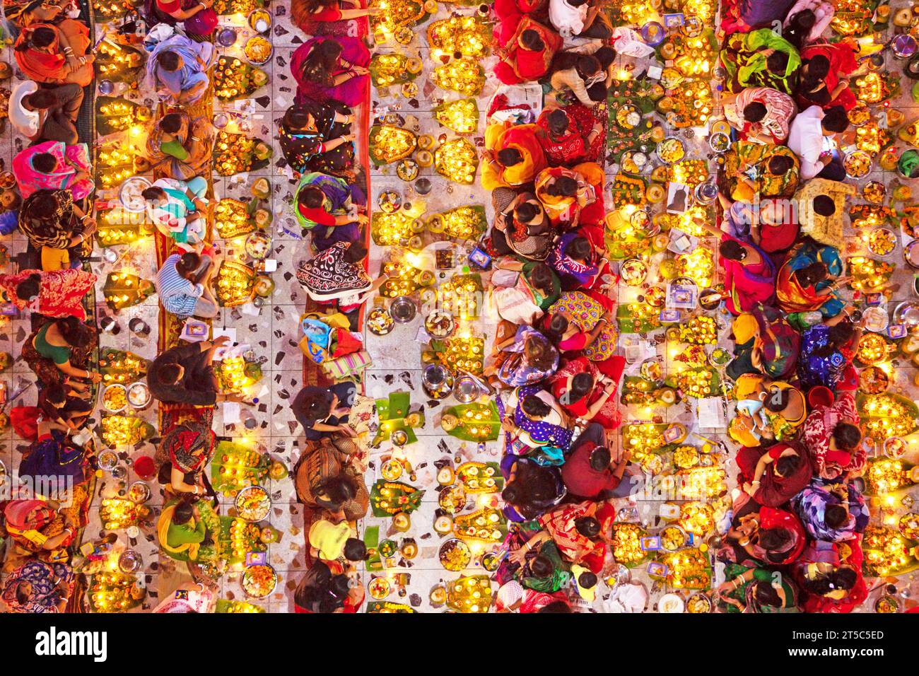 Dhaka, Bangladesh. 4th Nov, 2023. Hindu devotees sit with Prodip ...