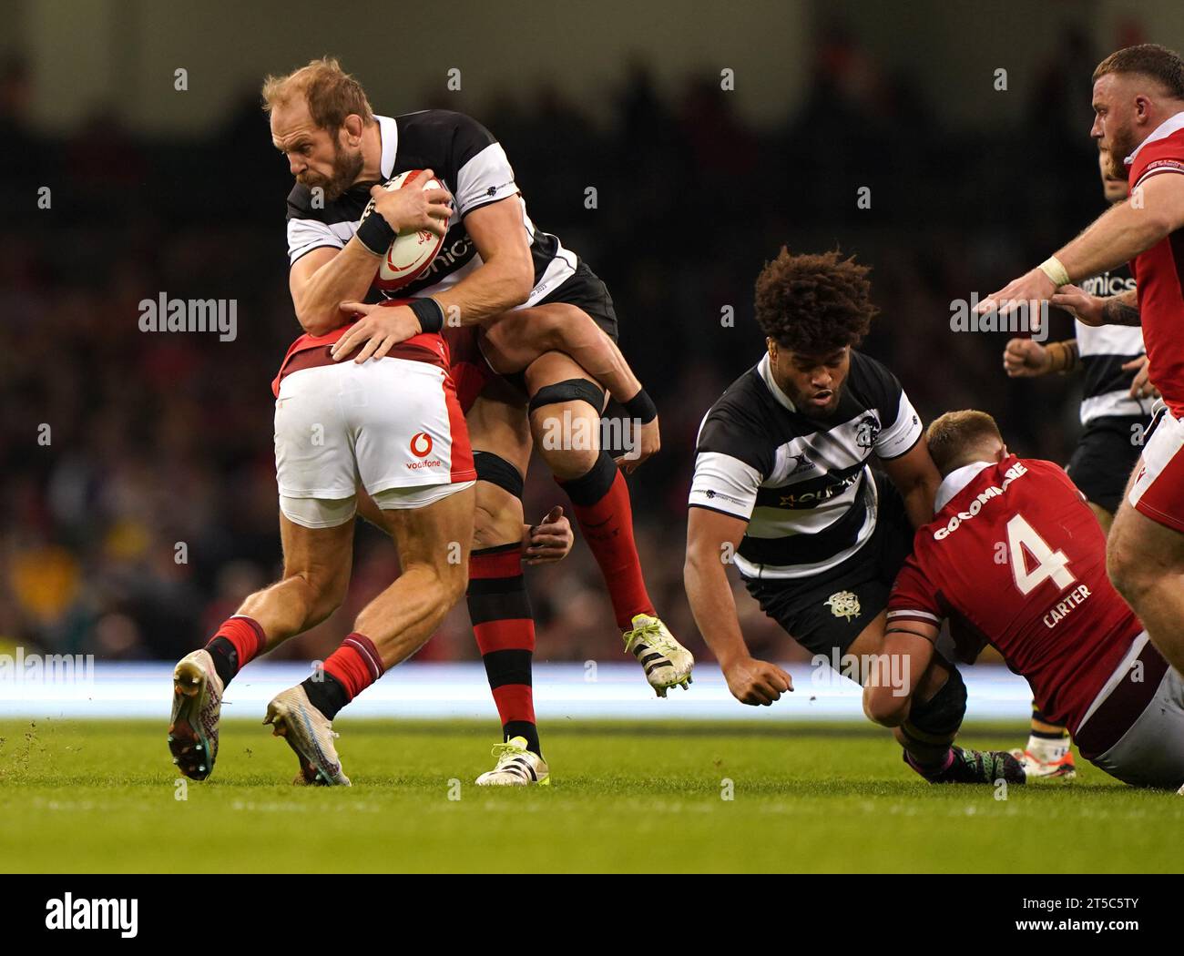 Barbarians' Alun Wyn Jones tackled by Wales' Johnny Williams during the ...