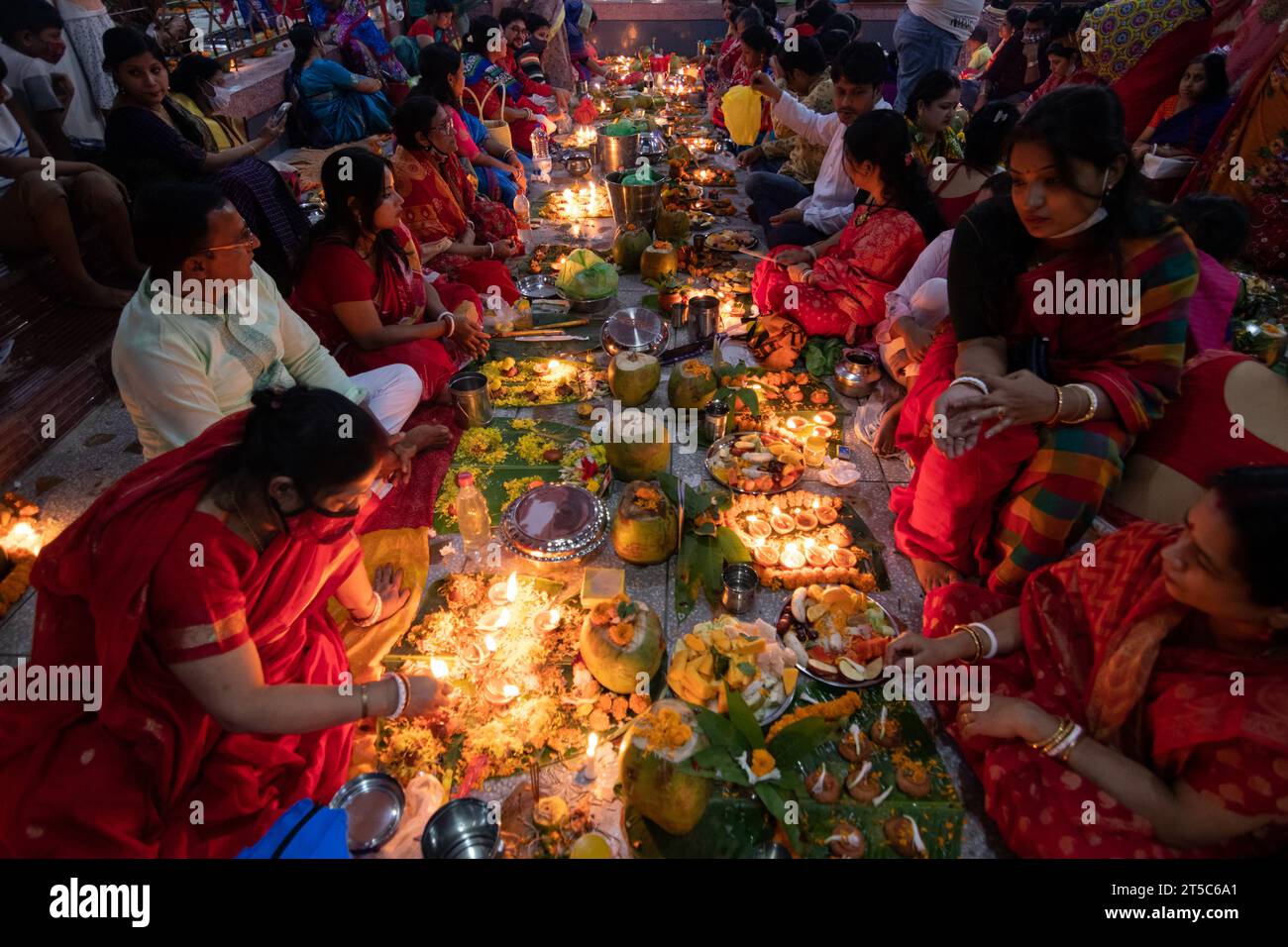 Dhaka, Bangladesh. 4th Nov, 2023. Hindu devotees sit with Prodip ...