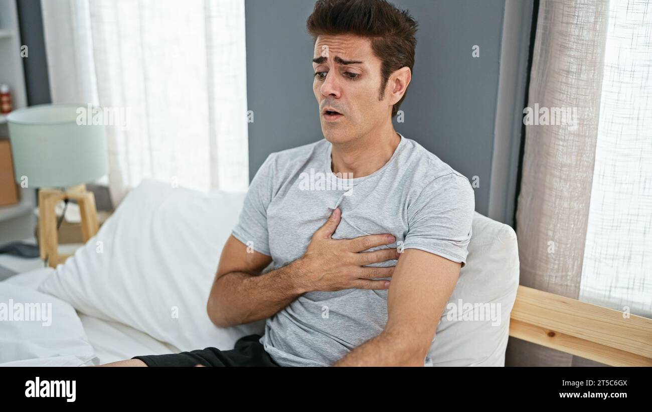 Heart attack man bed hi-res stock photography and images - Alamy