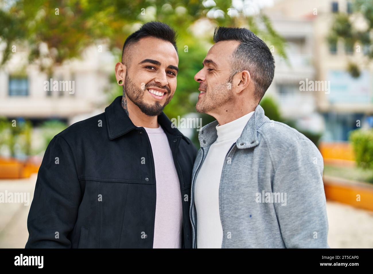 Two men couple smiling confident standing together at park Stock Photo ...