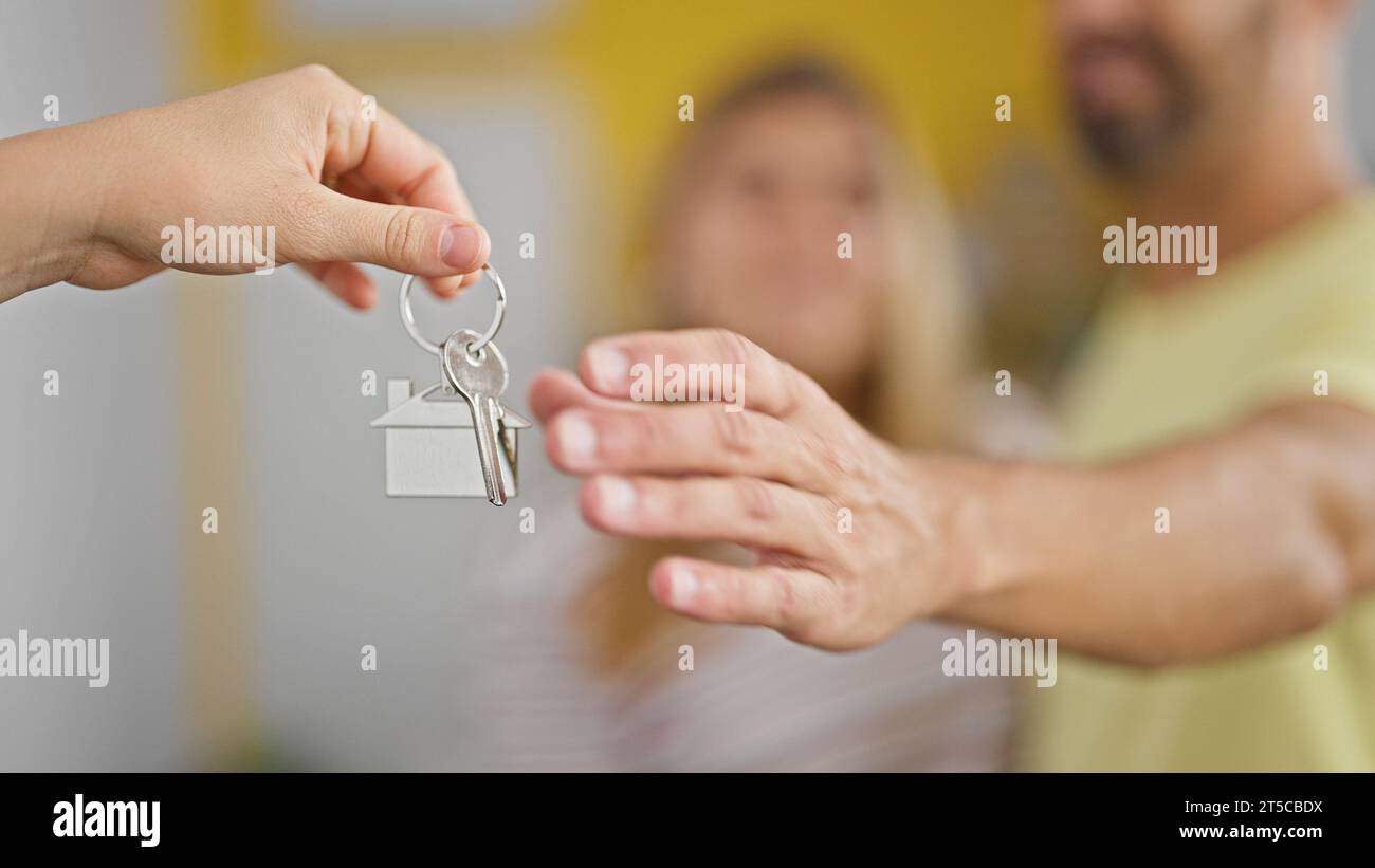 Couple receiving house keys hi-res stock photography and images - Alamy