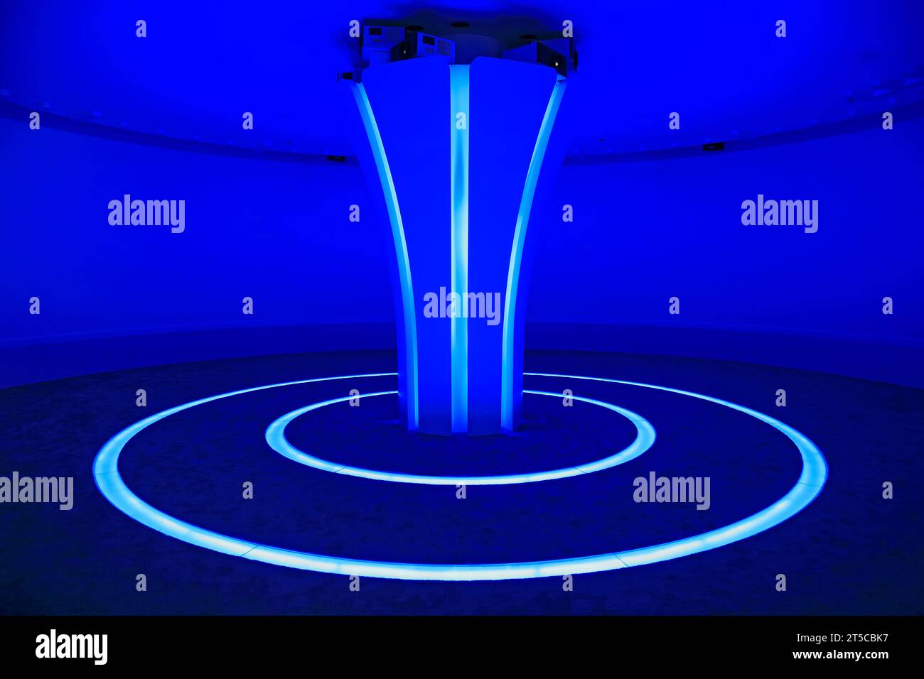 Blue columns and oval in a park Stock Photo - Alamy