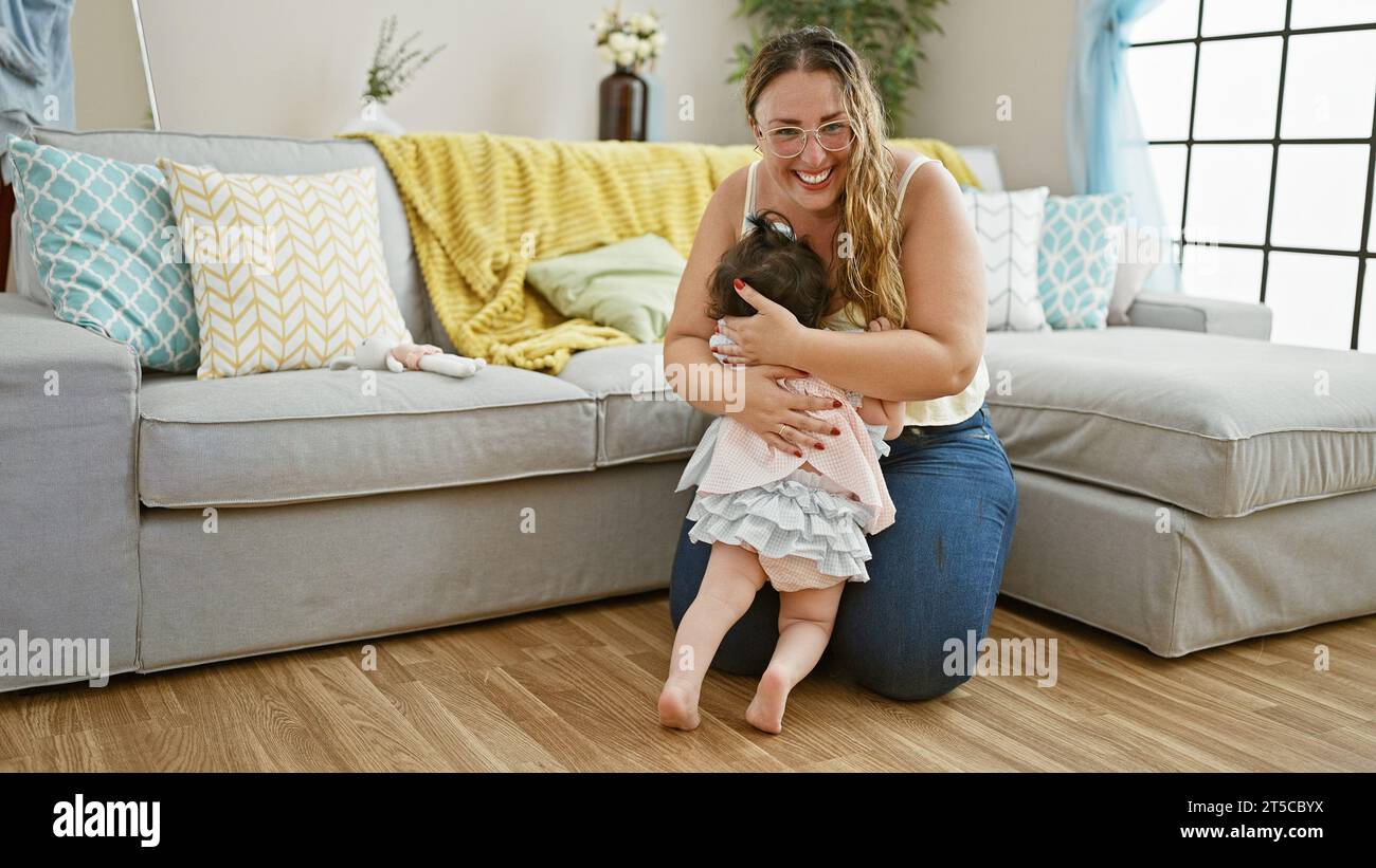 Joyous Mother Embracing Daughter Chuckling And Flashing Beaming Smiles