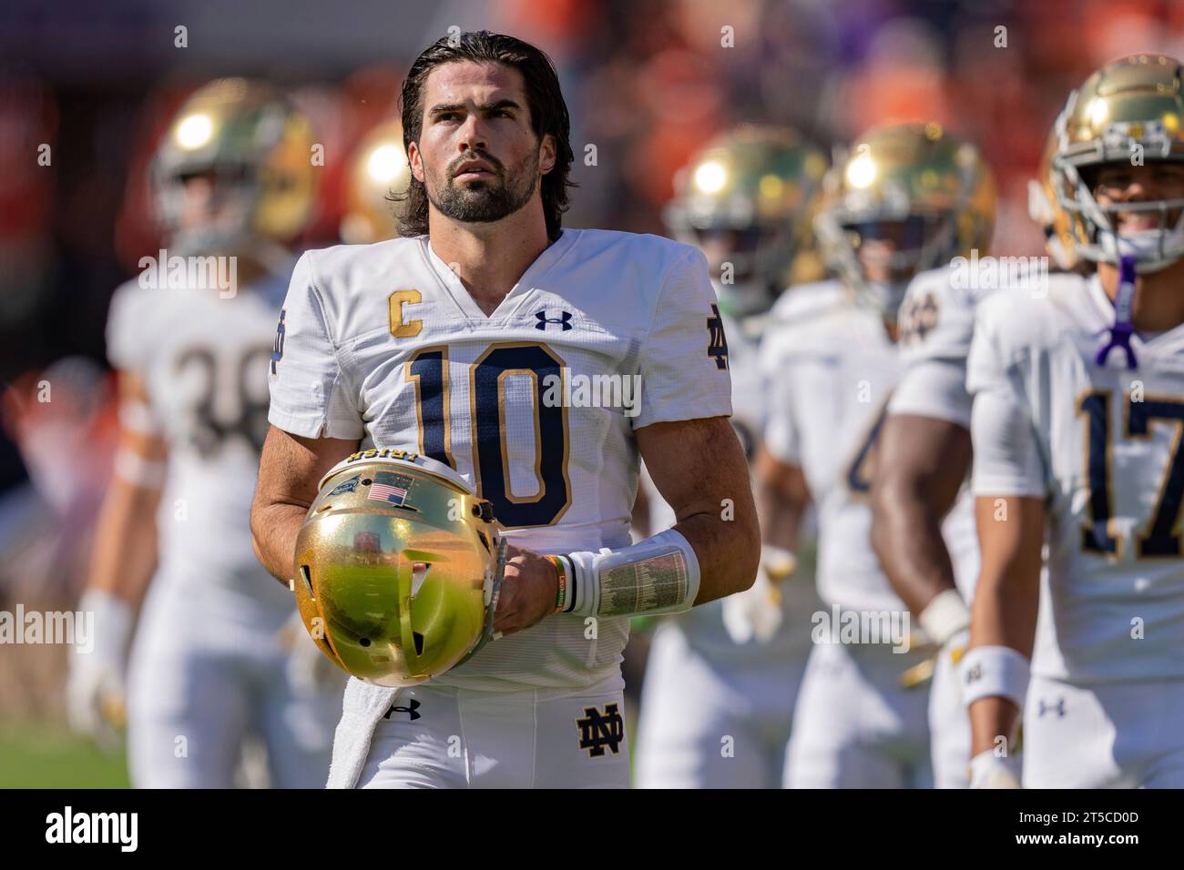 Notre Dame quarterback Sam Hartman (10) looks on before an NCAA college ...