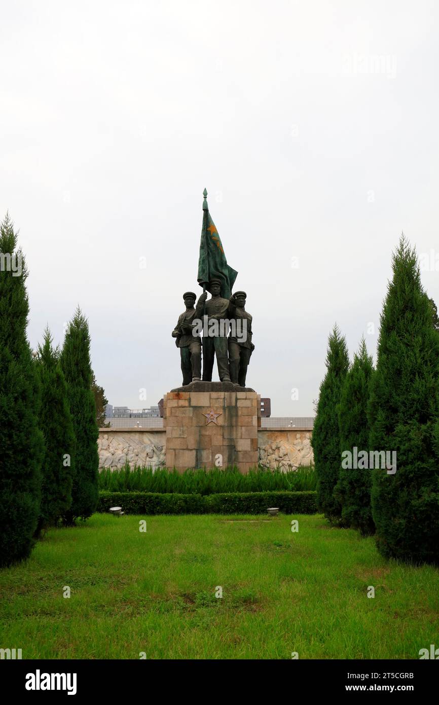 PLA soldiers sculpture in a park Stock Photo - Alamy