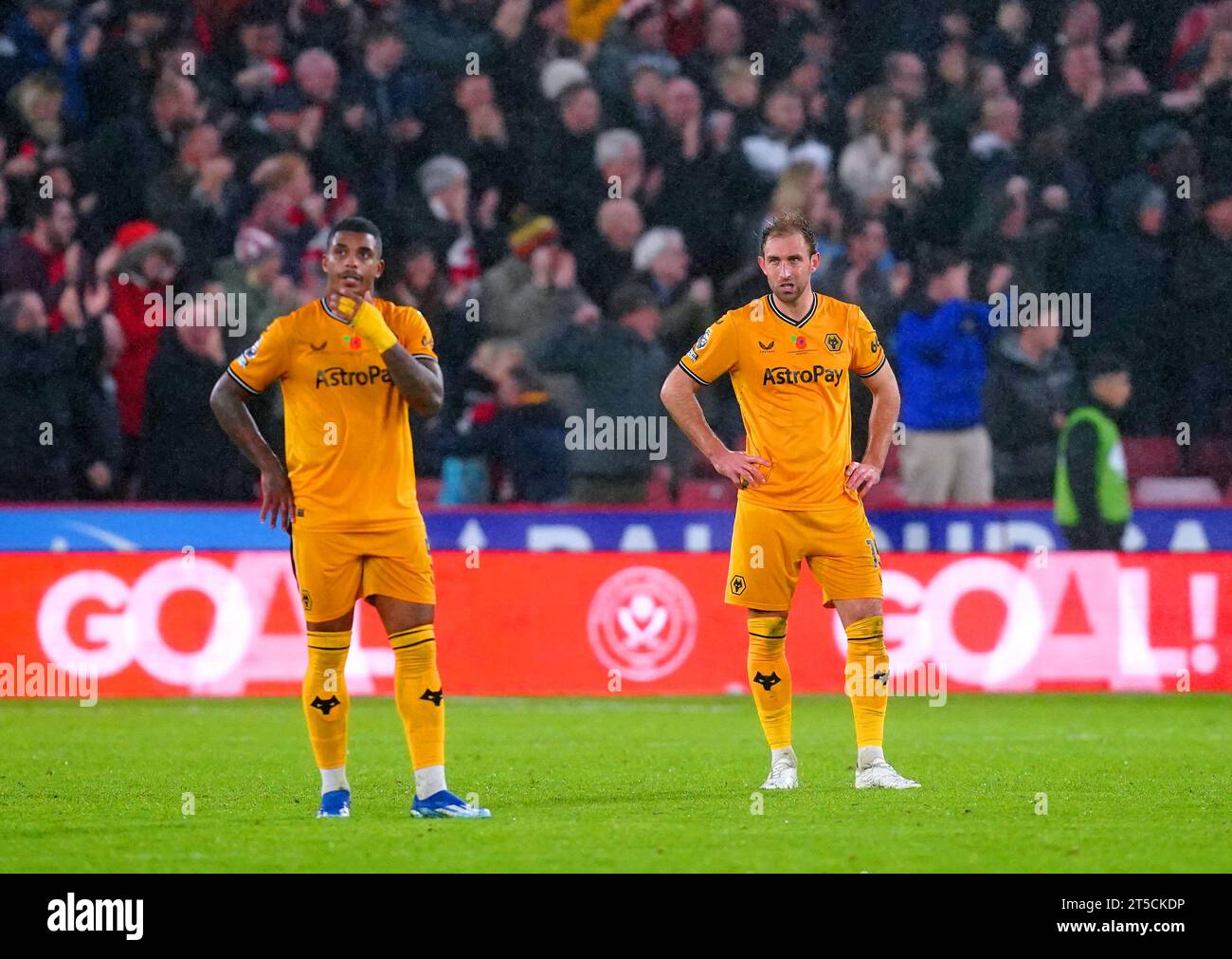 Wolverhampton Wanderers' Craig Dawson (right) and Mario Lemina appear ...