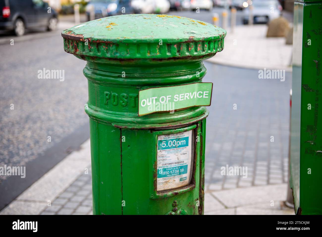 A green post box in Ireland with an out of service notice Stock Photo ...