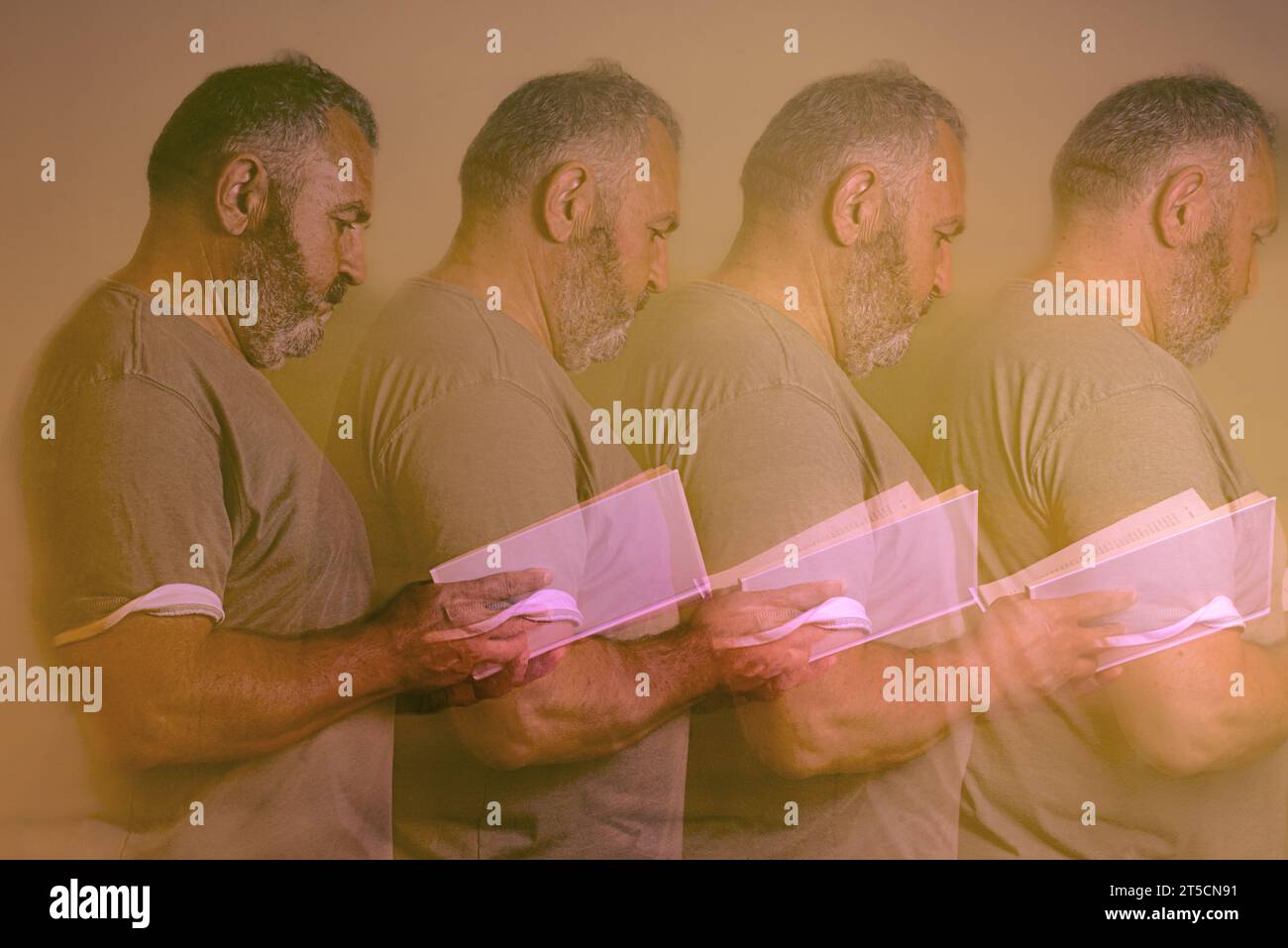 Man reading a book from which several copies of his person come out in ...
