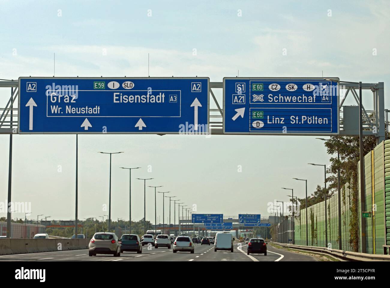 Large road sign of places in Austria and signs for state borders Stock ...
