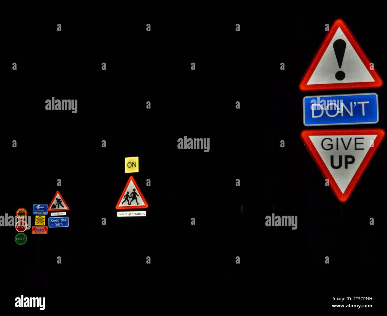 Tom Biddulph's installation. a set of revised road signs giving ...