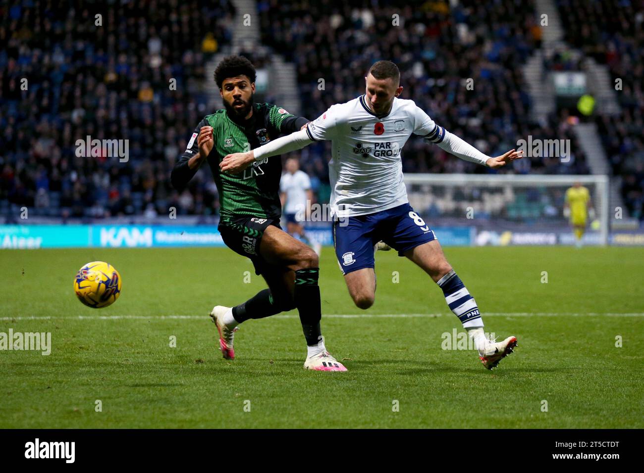Coventry City's Ellis Simms (left) and Preston North End's Alan Browne ...