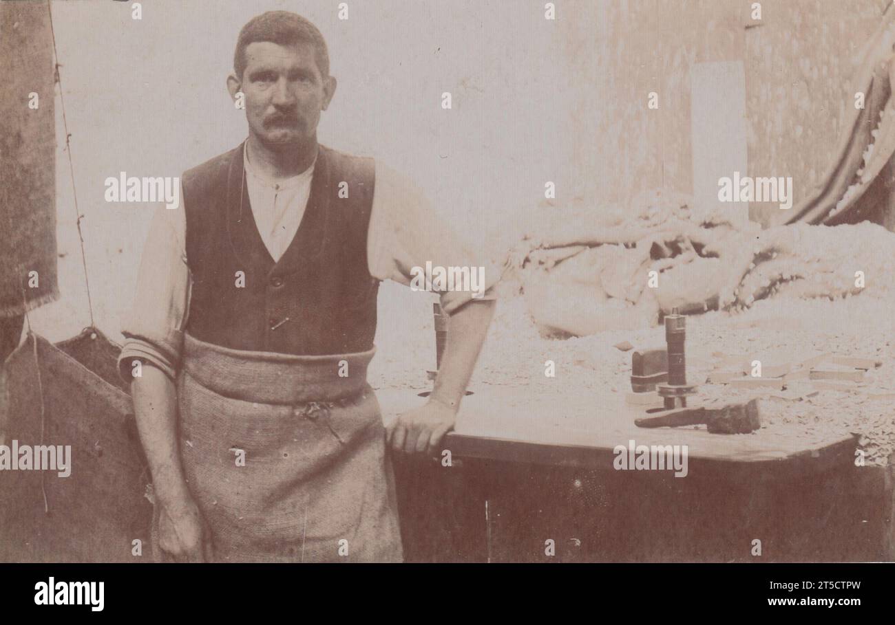 Early 20th century photograph of a carpenter or joiner standing by his ...
