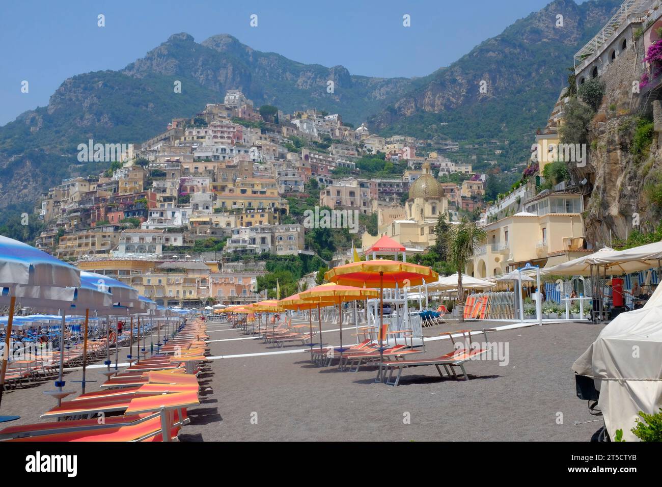 Positano town viewed from Spiaggia Grande beach with sunbeds Stock ...