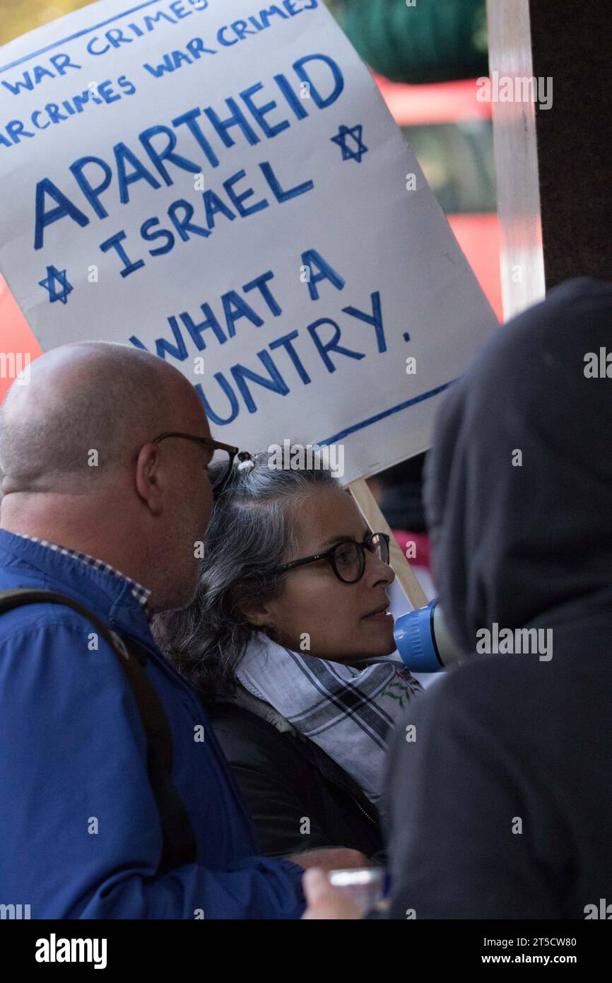 Westminster, London, UK. 4th November 2023. Woman using megaphone tells ...