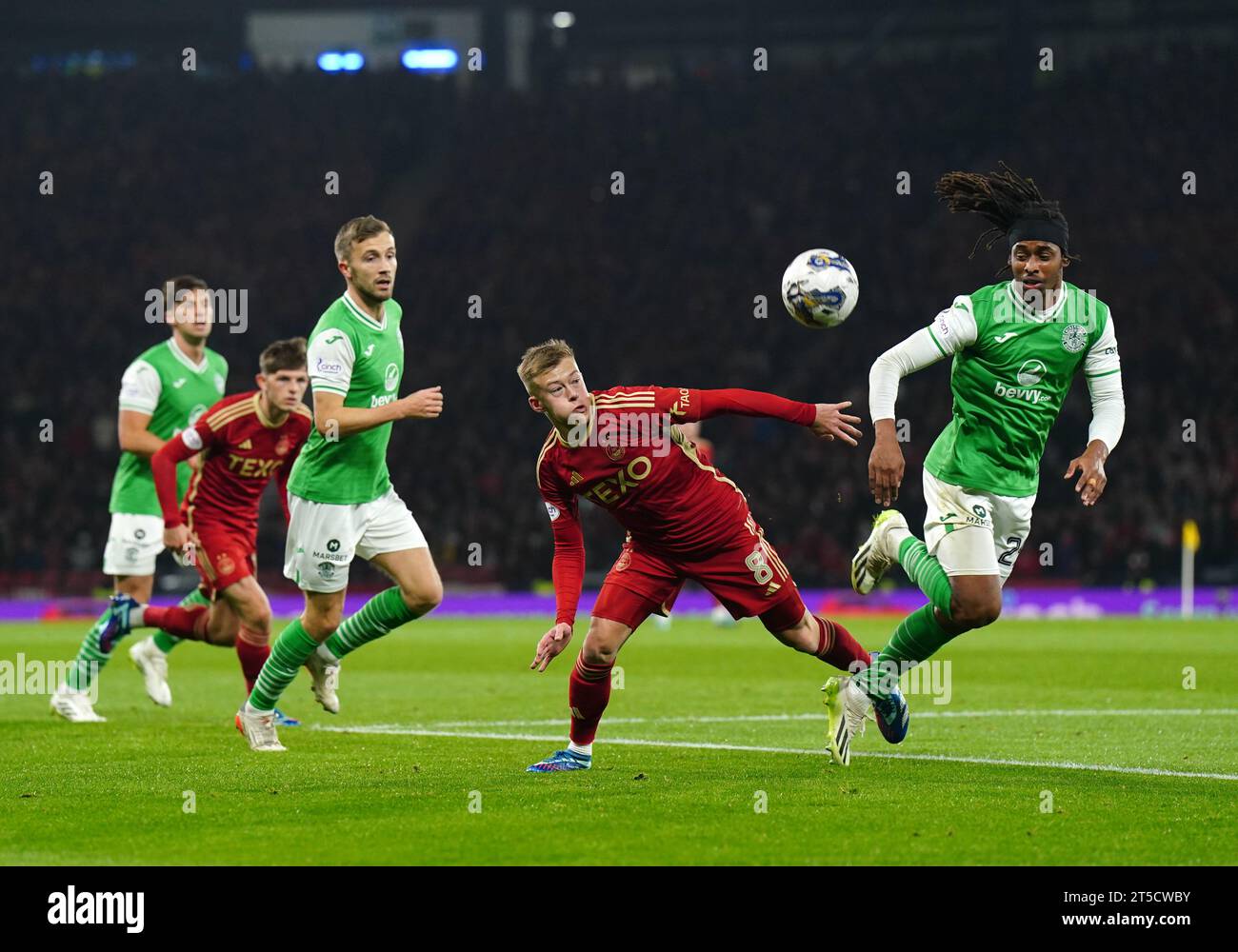 Aberdeen's Connor Barron and Hibernian's Jair Tavares battle for the ball during the Viaplay Cup ...
