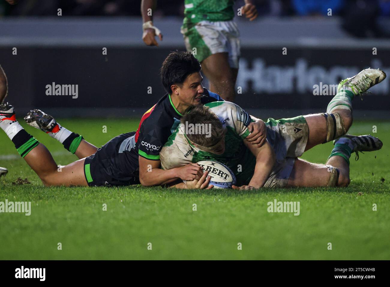 Harlequins' Marcus Smith (left) with Newcastle Falcons' Guy Pepper ...