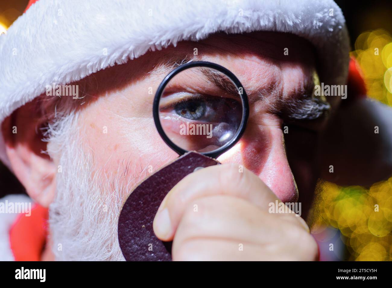 Merry Christmas and Happy New Year. Santa Claus looking through ...