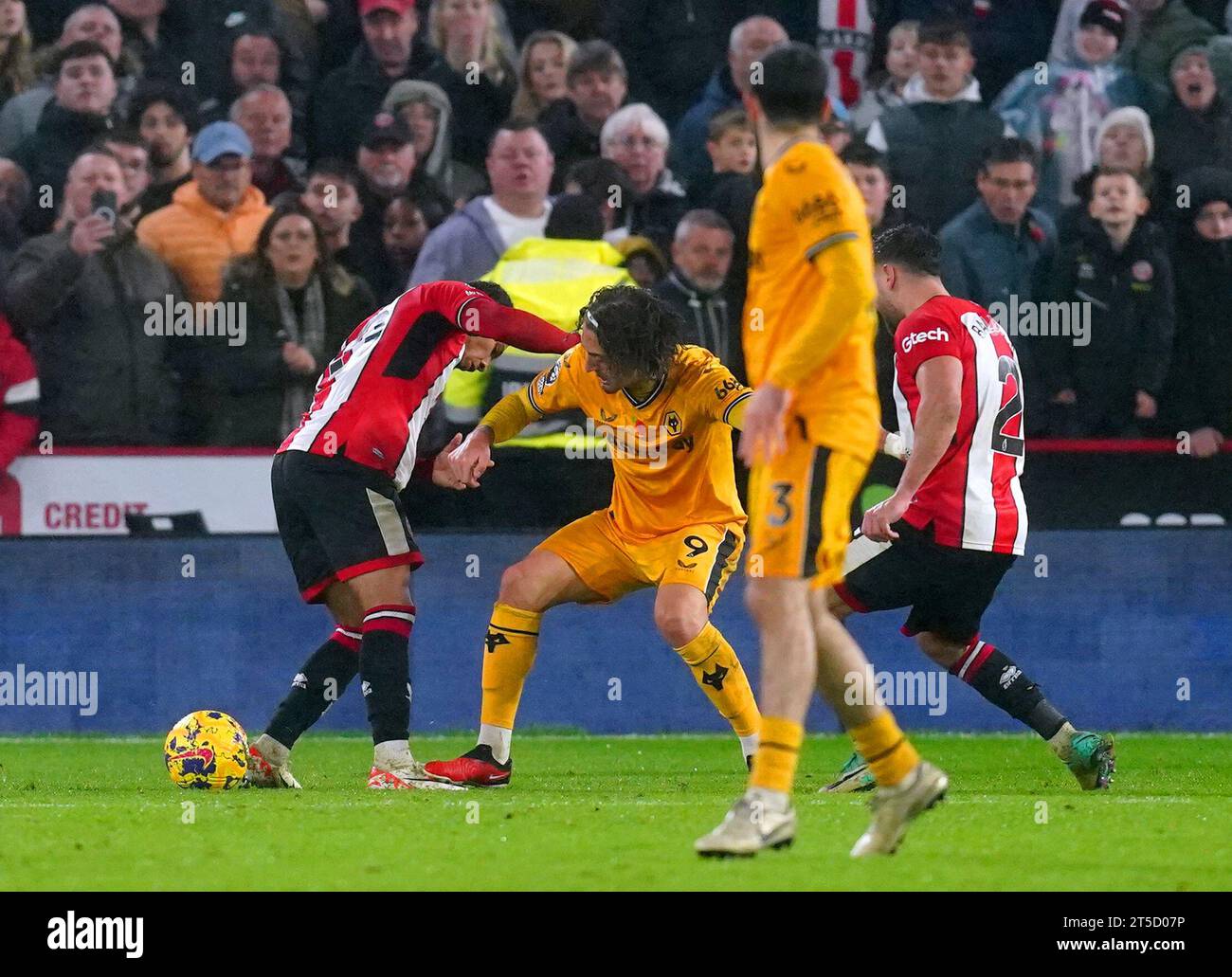 Wolverhampton Wanderers' Fabio Silva and Sheffield United's Cameron Archer battle for the ball ...