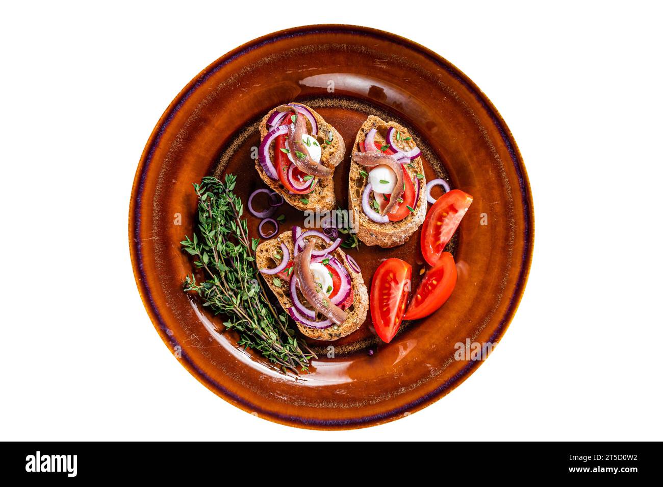 Spanish tapas on bread with olive oil, herbs, tomatoes and spicy ...