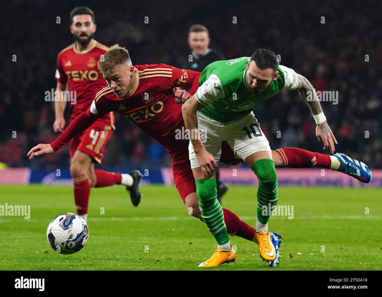 Aberdeen's Connor Barron (left) and Hibernian's Martin Boyle battle for the ball during the ...