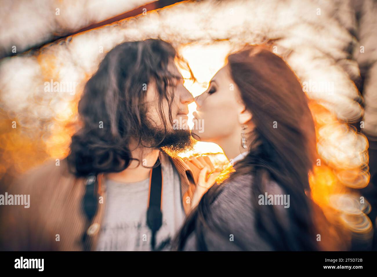 In this heartfelt portrait, a couple deeply in love shares a tender ...